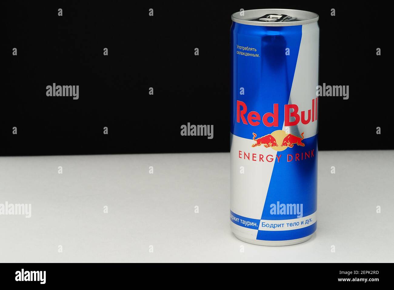 ENERGY drink RED BULL in an aluminum jar. Editorial image. Close-up ...