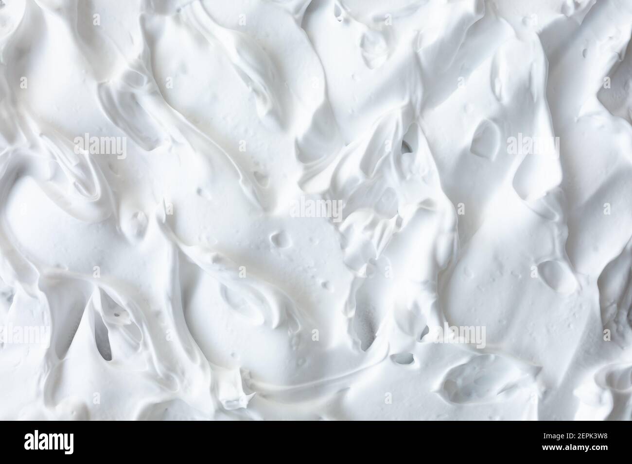 Texture of the heavy whipped cream. Delicate creamy white consistency ...