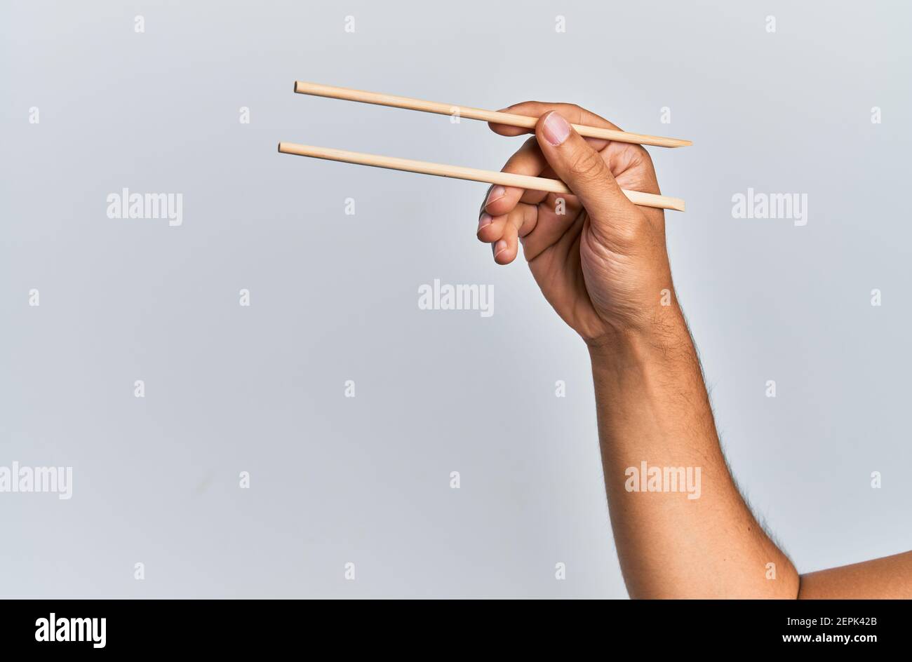 Man hand bamboo chopsticks hi-res stock photography and images - Alamy