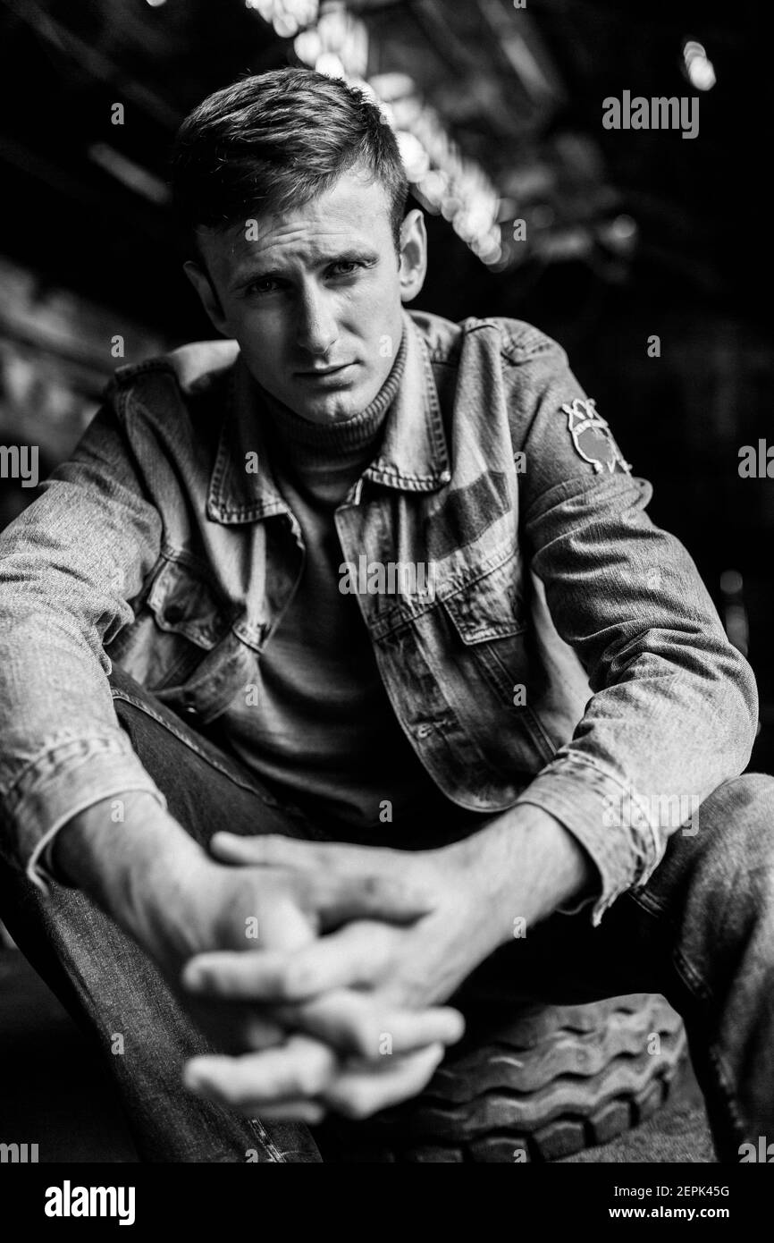 Confident brutal guy in Black and White Stock Photos & Images - Alamy