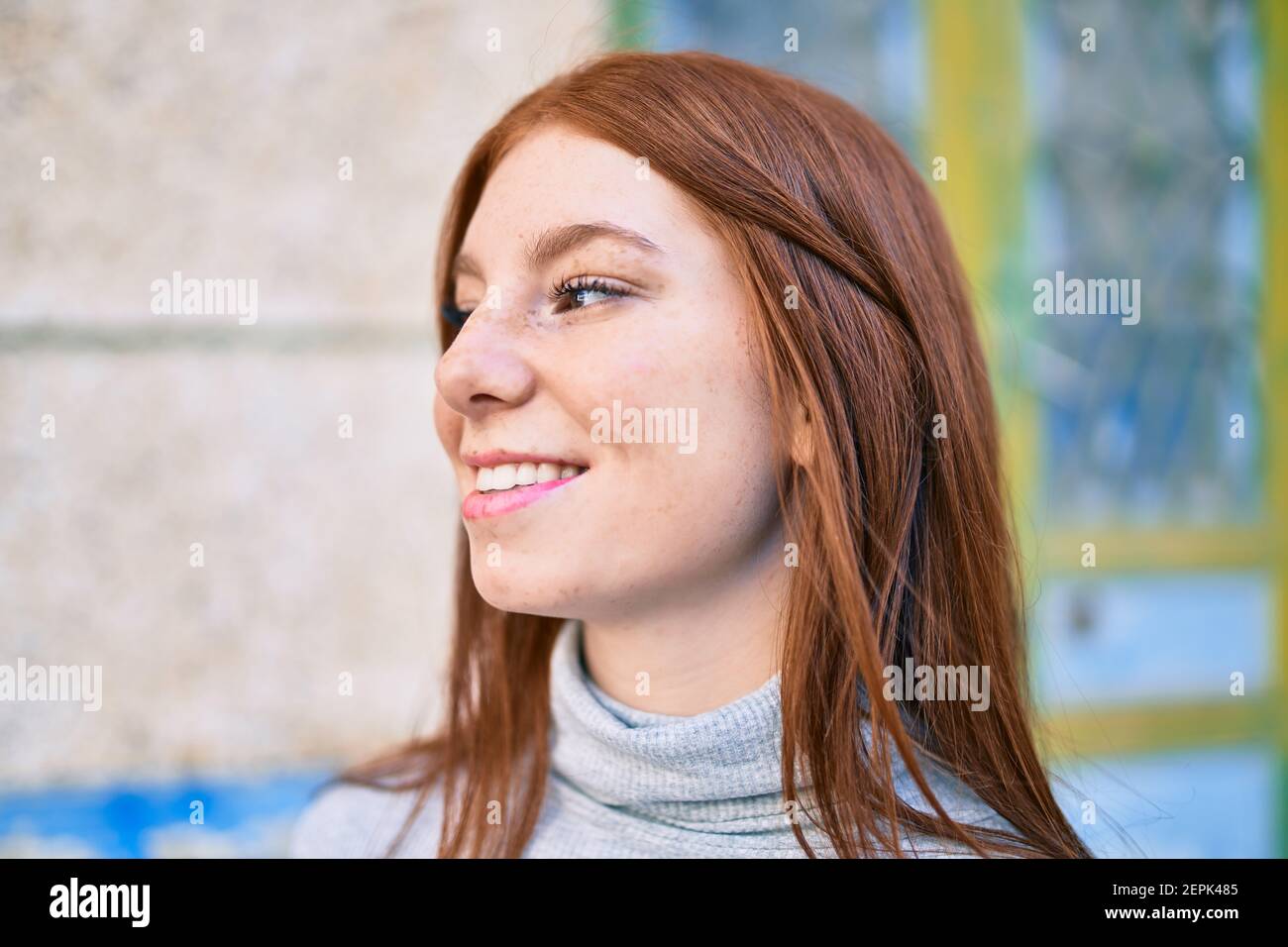 Young irish teenager girl smiling happy walking at the city Stock Photo ...