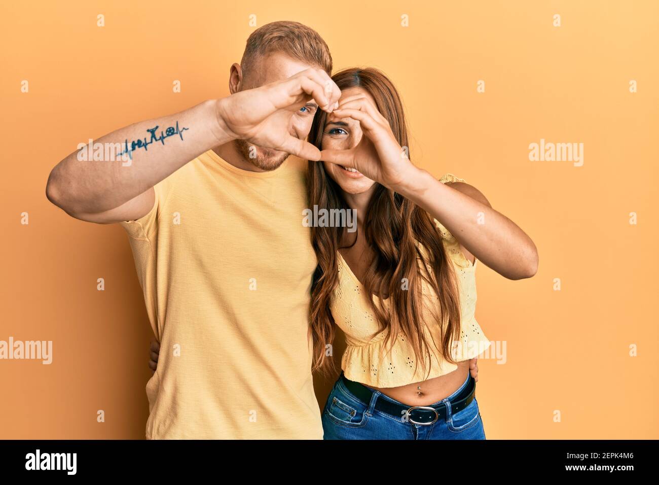 Young couple of girlfriend and boyfriend hugging and standing together ...