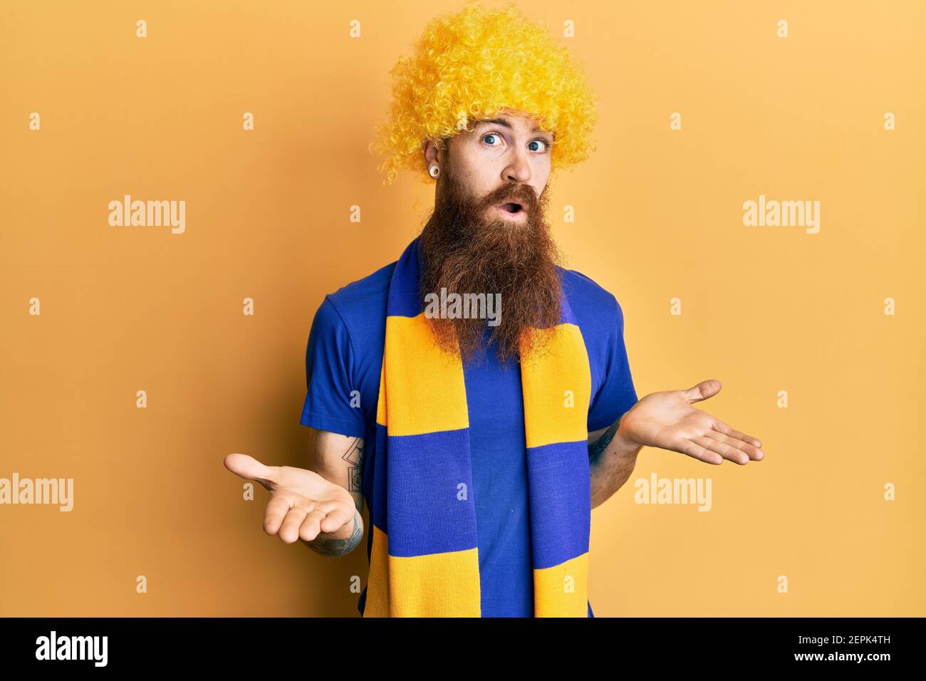 Redhead man with long beard football hooligan cheering game wearing ...