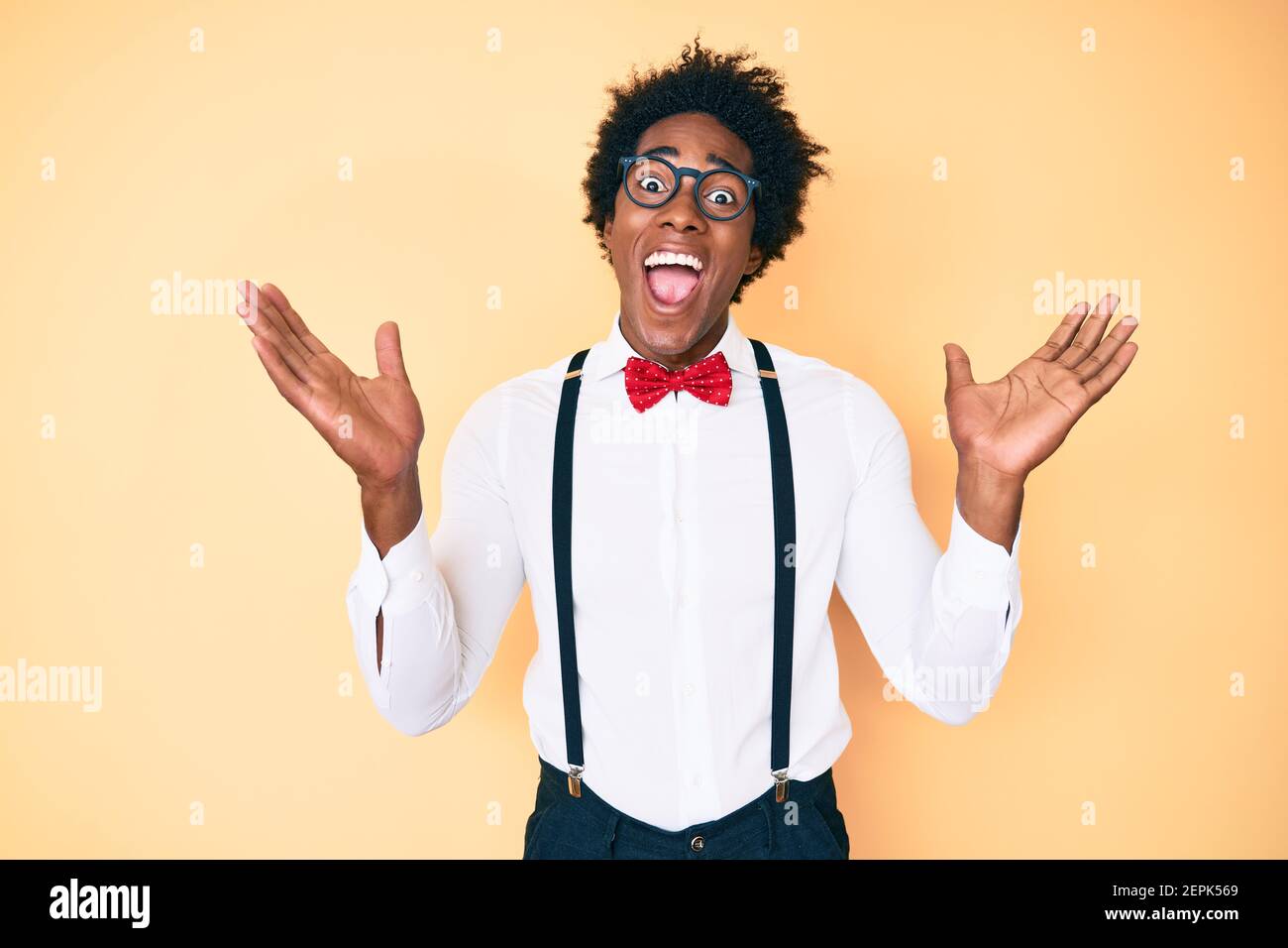 Handsome african american man with afro hair wearing hipster elegant ...