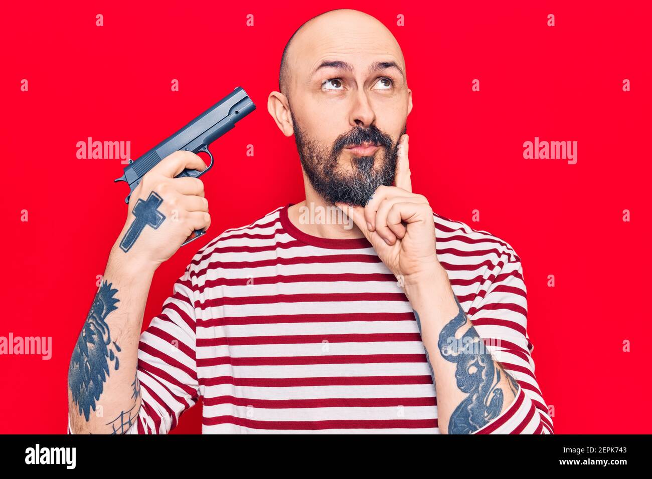 Holding Gun To Chin High Resolution Stock Photography and Images - Alamy