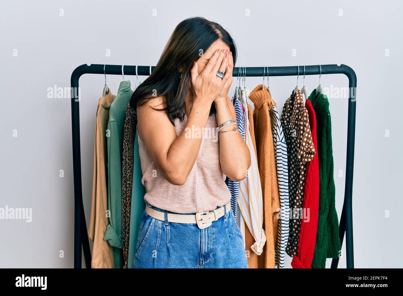 Middle age brunette woman working as professional personal shopper with ...