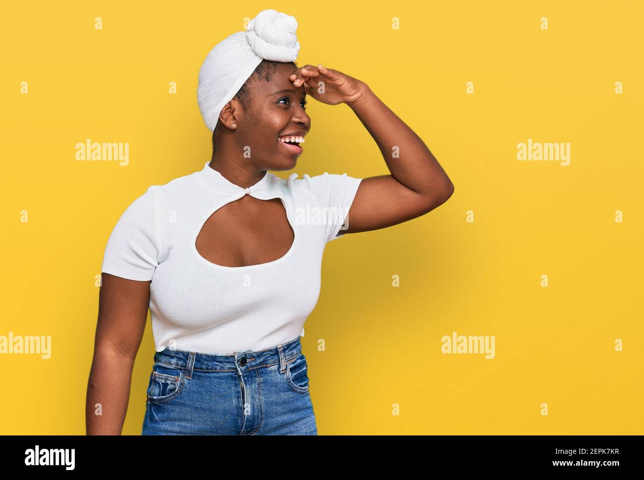 Young african woman with turban wearing hair turban over isolated ...