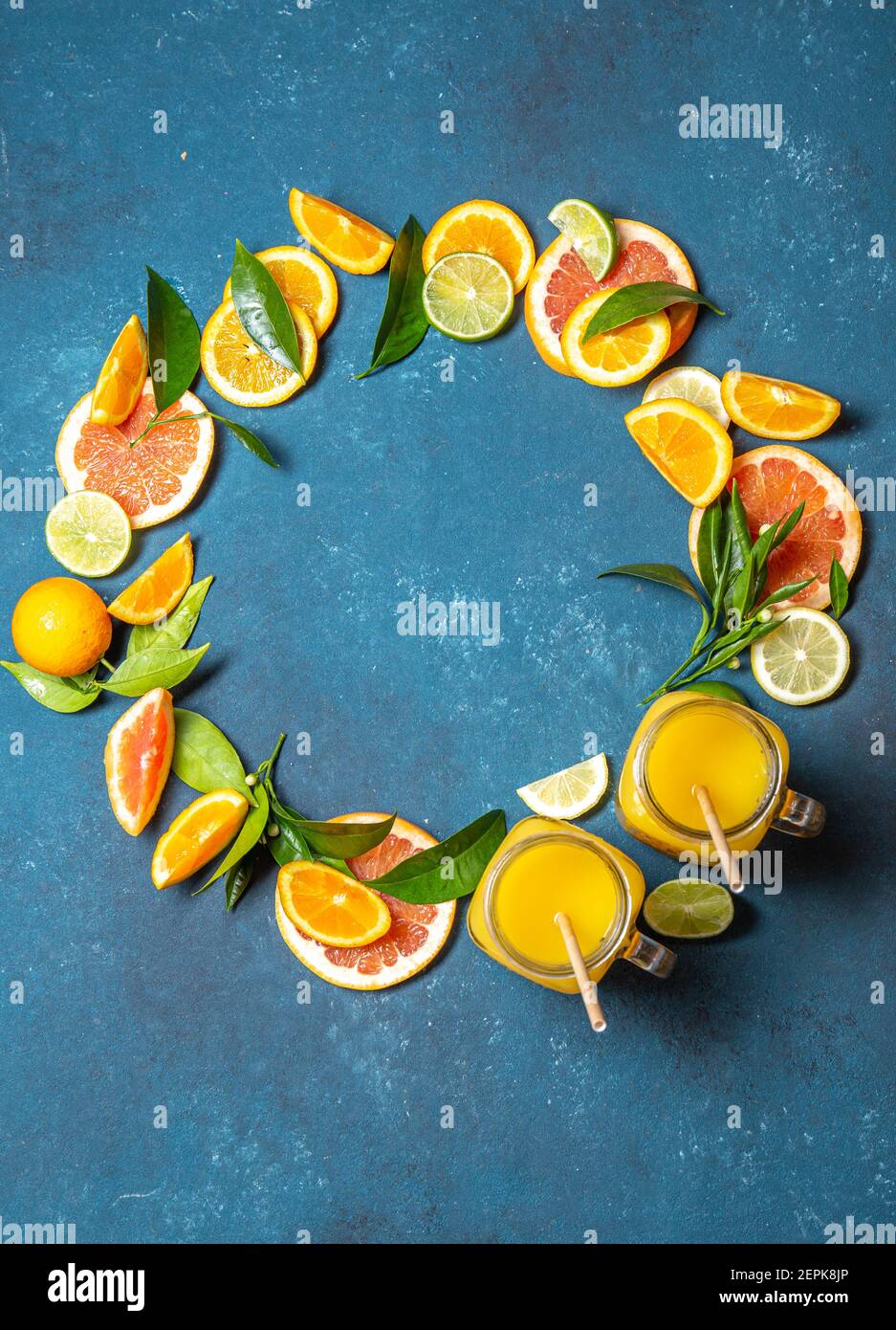 Citrus slices - orange,lemon and grapefruit with green leaves and ...