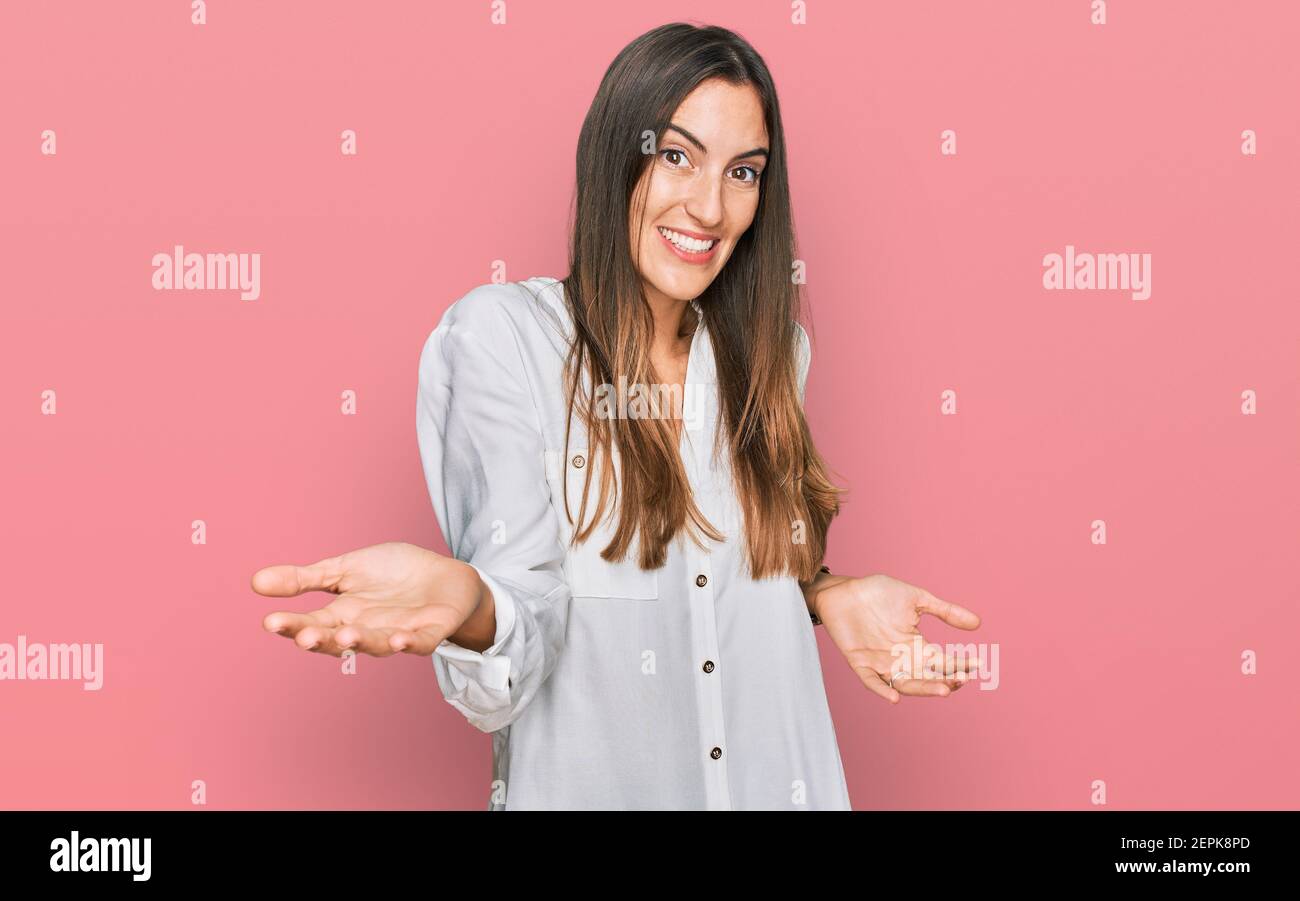 Young beautiful woman wearing casual clothes smiling cheerful with open ...