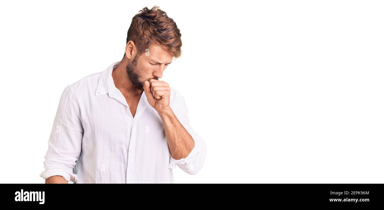 Young caucasian man wearing casual clothes feeling unwell and coughing ...