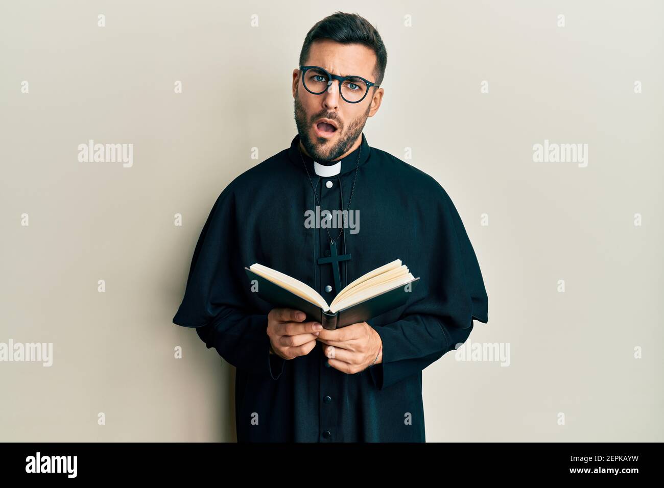 Man holding bible thinking hi-res stock photography and images - Alamy