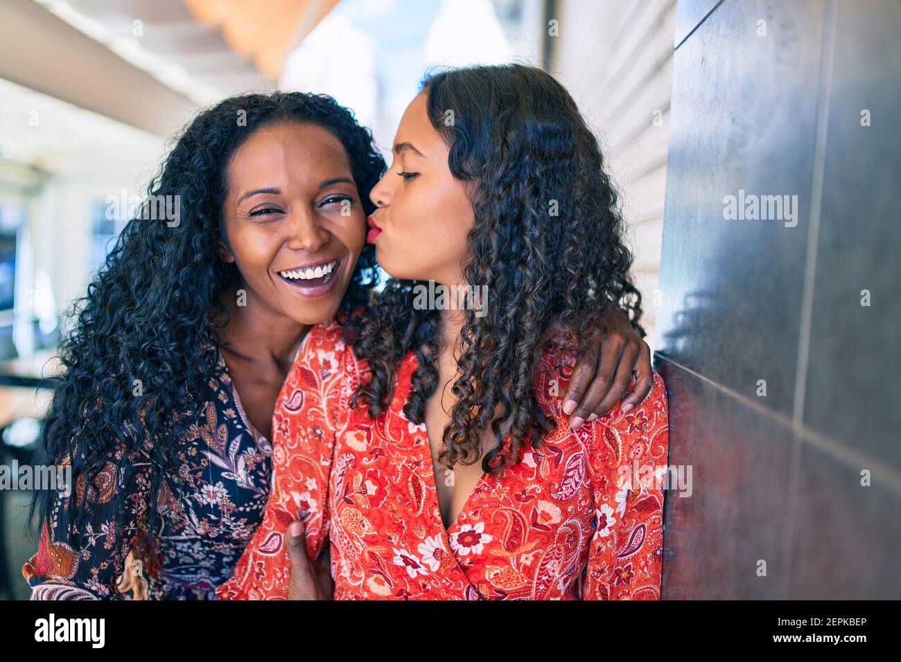 Black couple kissing daughter hi-res stock photography and images - Alamy