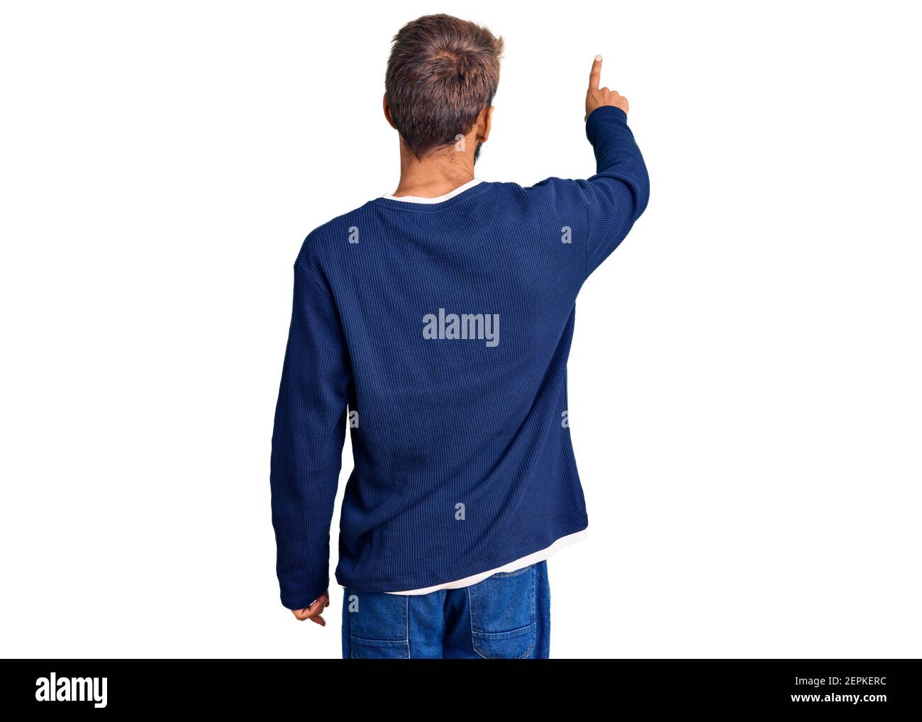 Handsome blond man with beard wearing casual sweater posing backwards ...