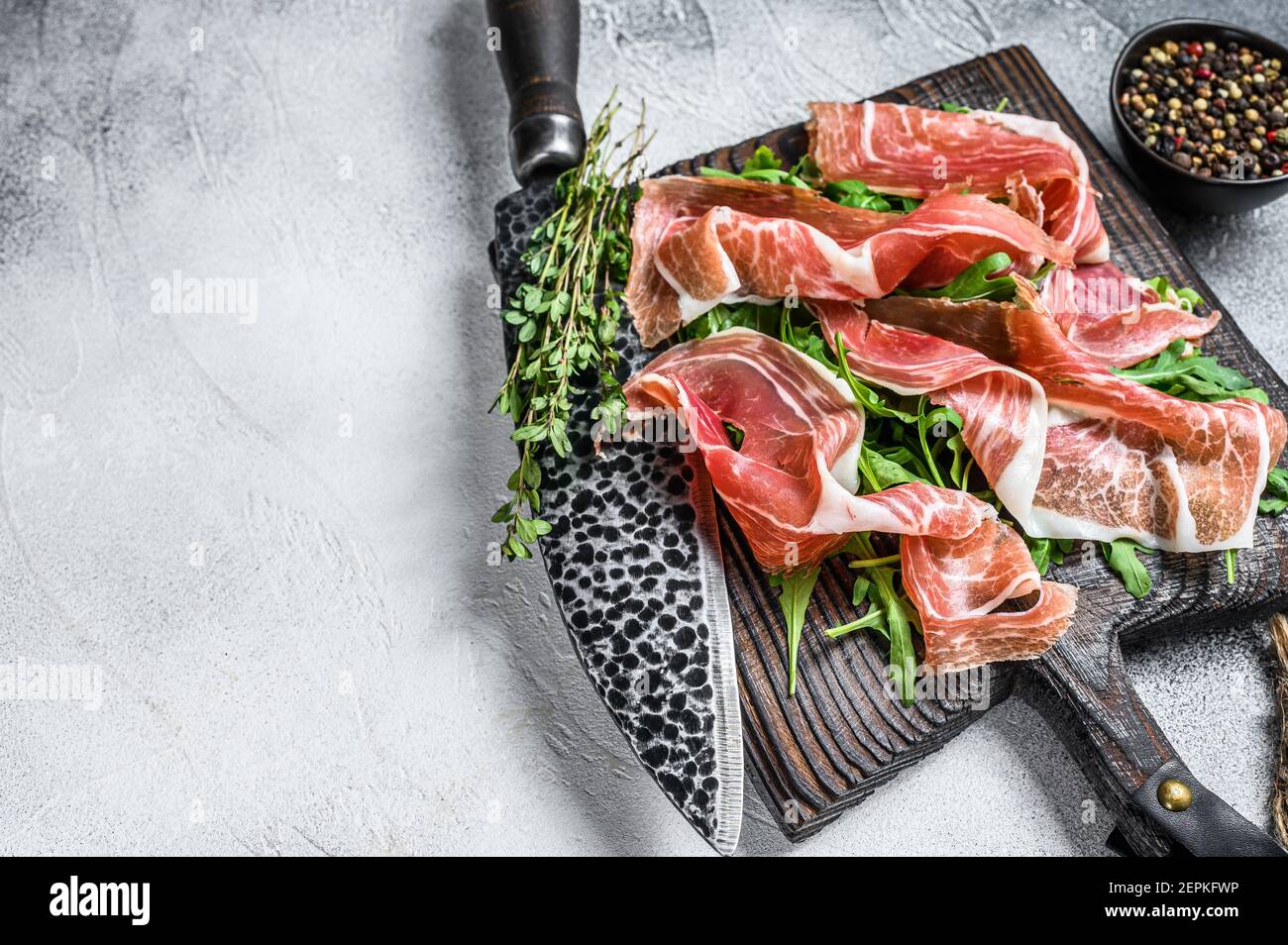 Sliced Spanish Jamon Serrano ham or Prosciutto Crudo Parma ham. White ...