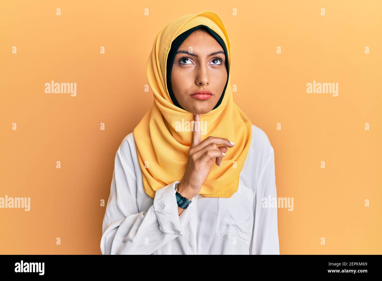 Young brunette arab woman wearing traditional islamic hijab scarf ...