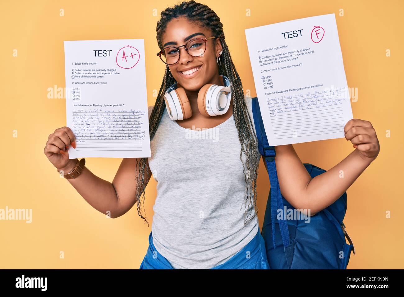 Young african american woman with braids showing failed and passed exam ...
