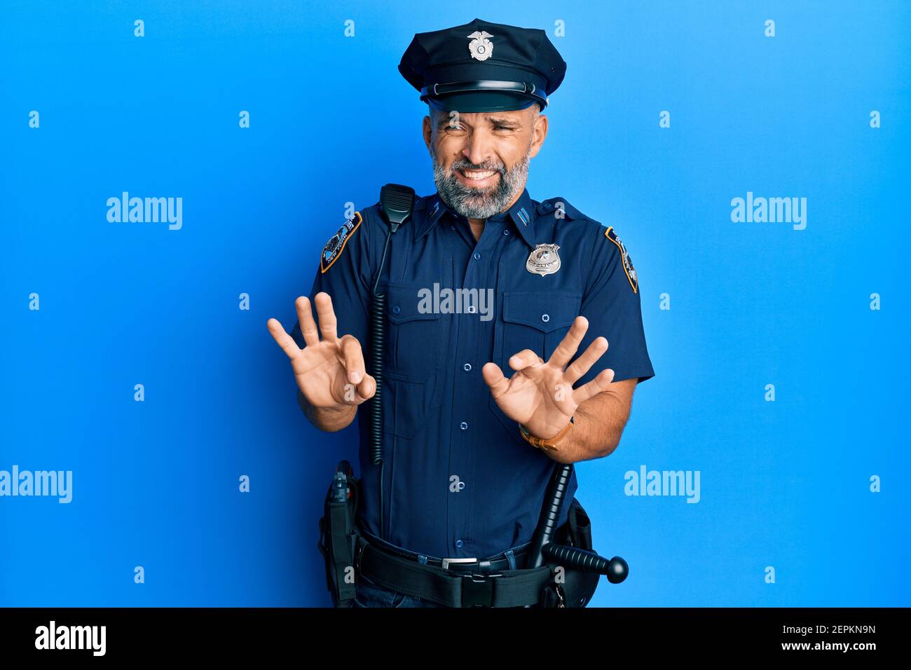 Negative policeman in uniform hi-res stock photography and images - Alamy