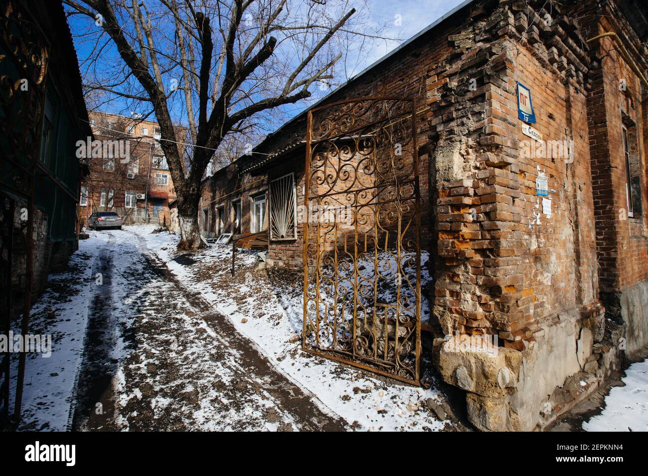 Old houses on low-rise street in old poverty part of Rostov-on-Don city ...