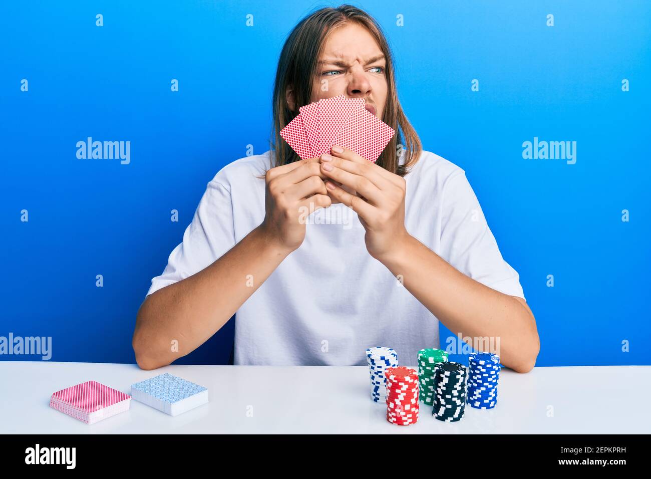 Man playing with his hair stress hi-res stock photography and images ...