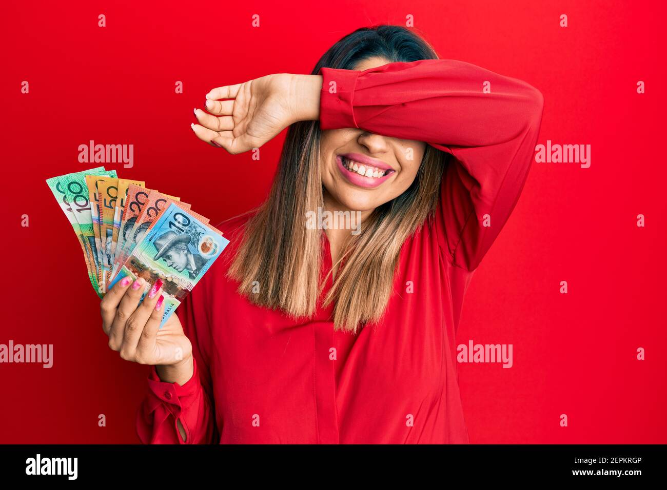 Excited girl showing dollar hi-res stock photography and images - Alamy