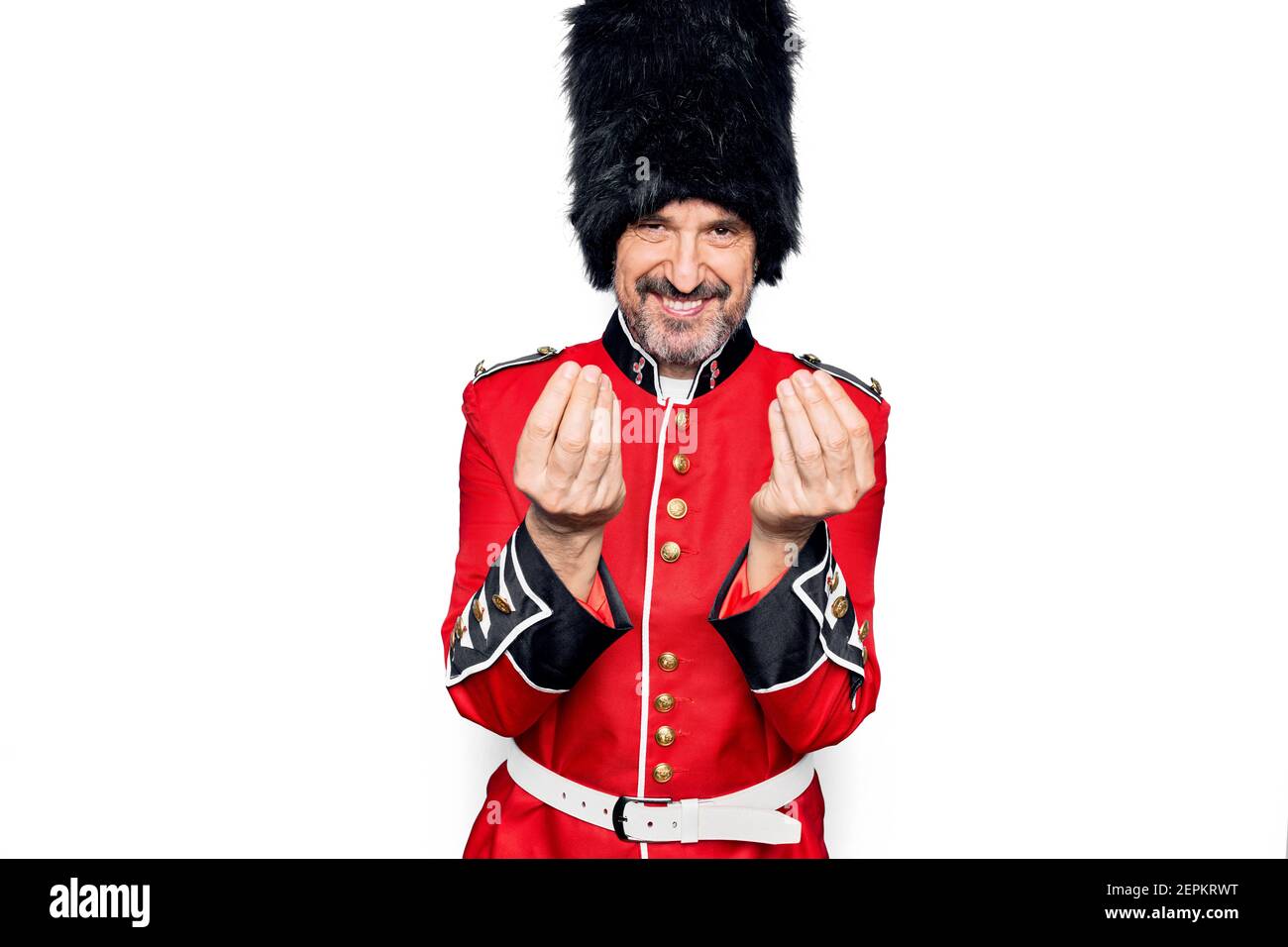 Middle age handsome wales guard man wearing traditional uniform over ...