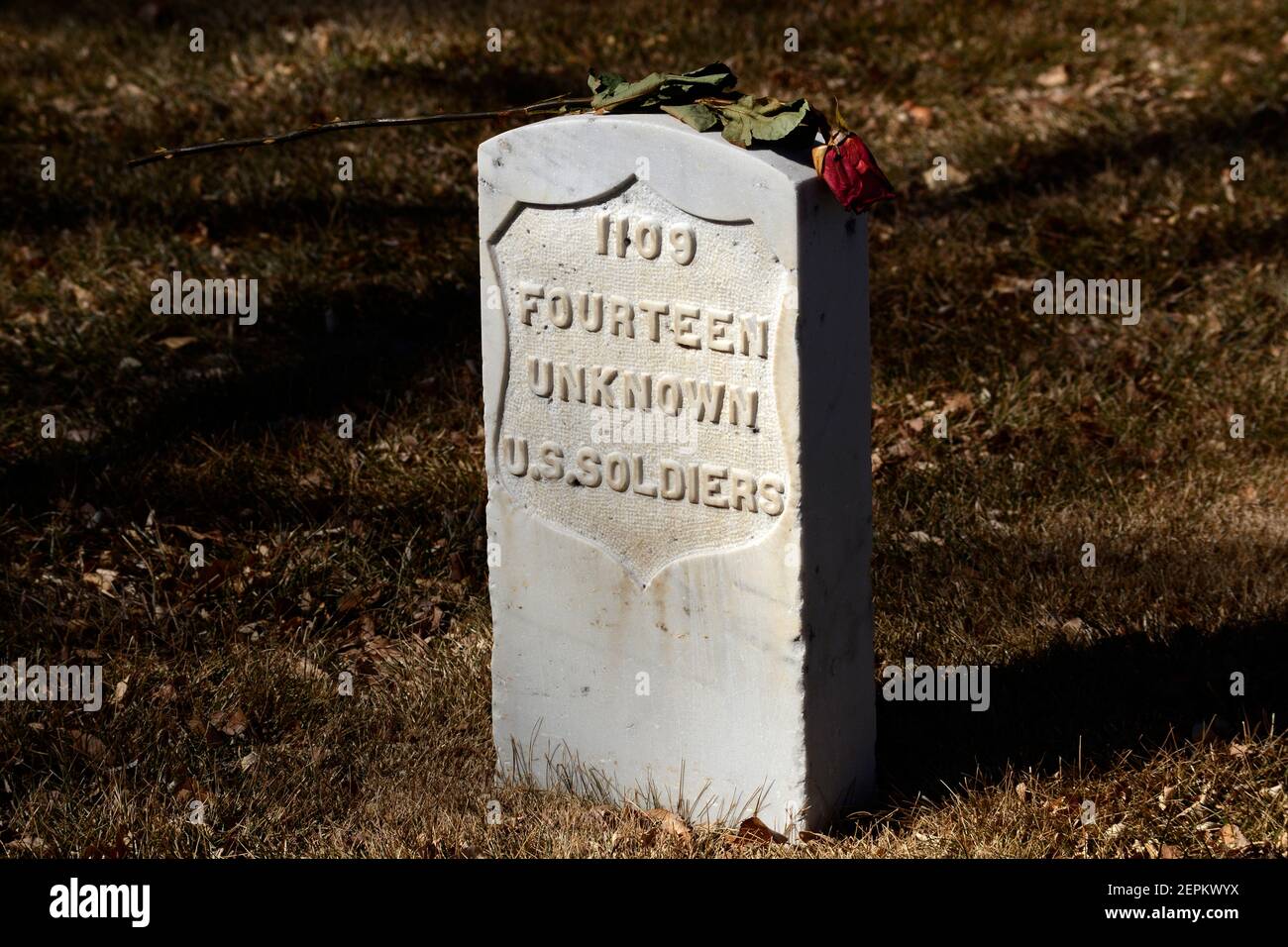 A rose tops the tombstone on the grave of fourteen unknown Civil War U ...