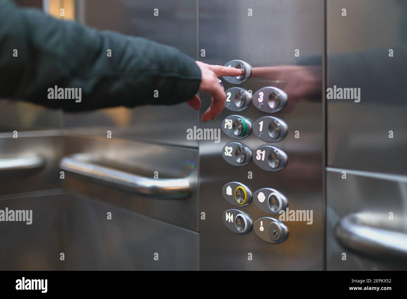 Woman Pushing Lift Button Elevator High Resolution Stock Photography ...