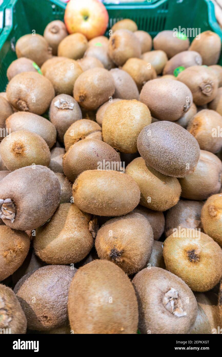 Fresh kiwi fruits pleased in farm market, juicy kiwi fruits in grocery ...