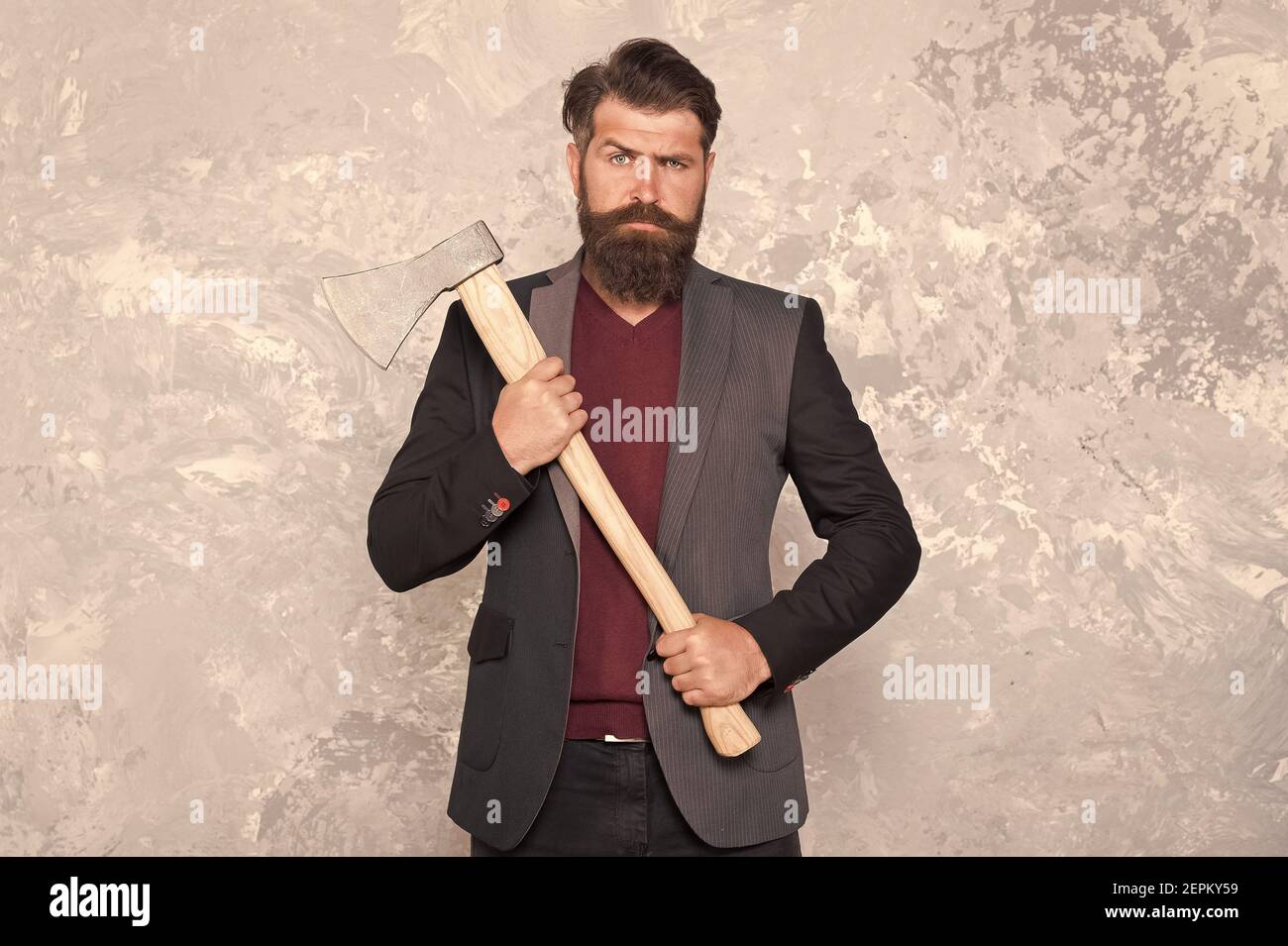 Keep the wild in you. Bearded man hold axe abstract background. Brutal ...