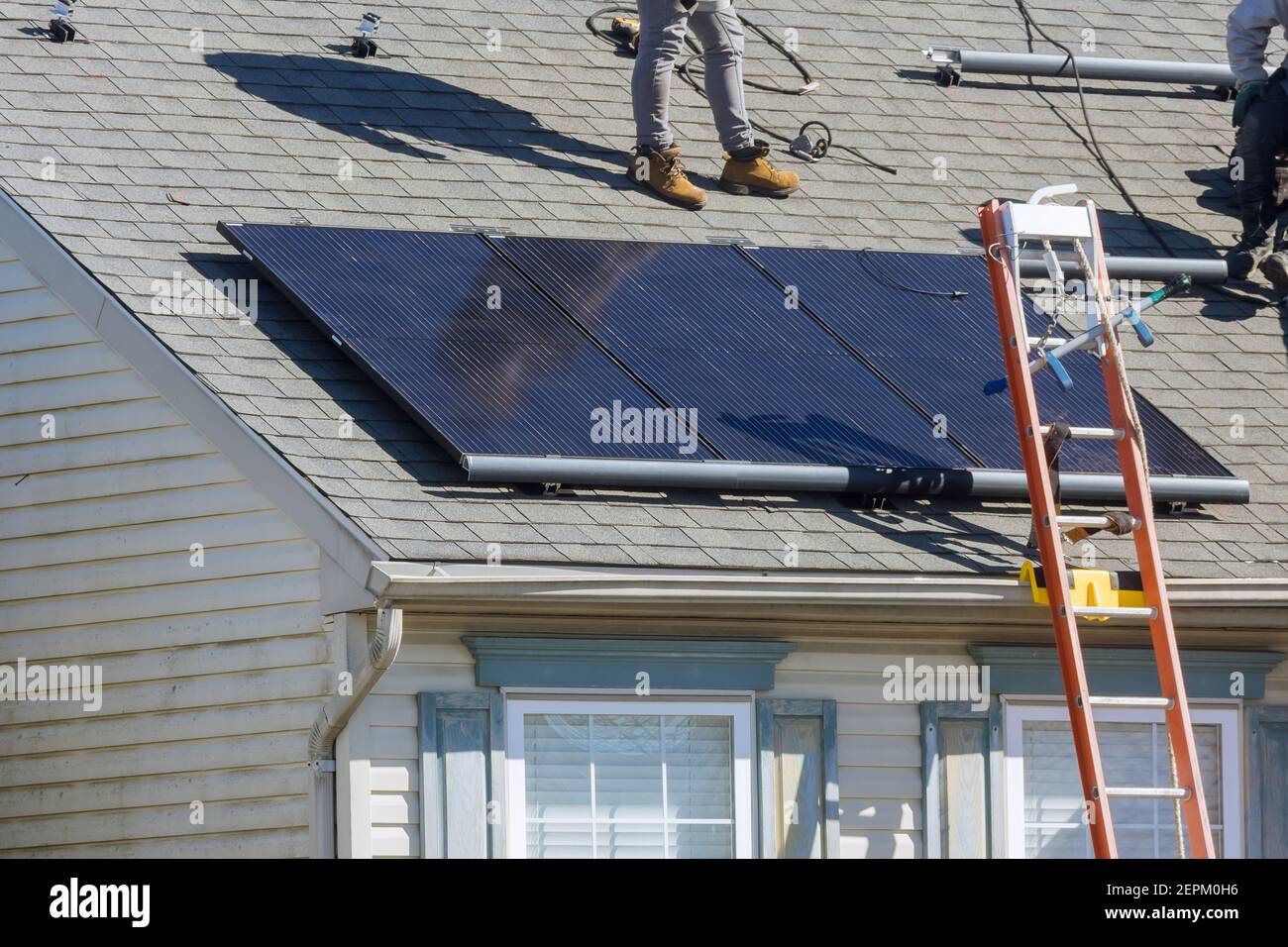Installed solar panels in use on roof of home for alternative energy ...