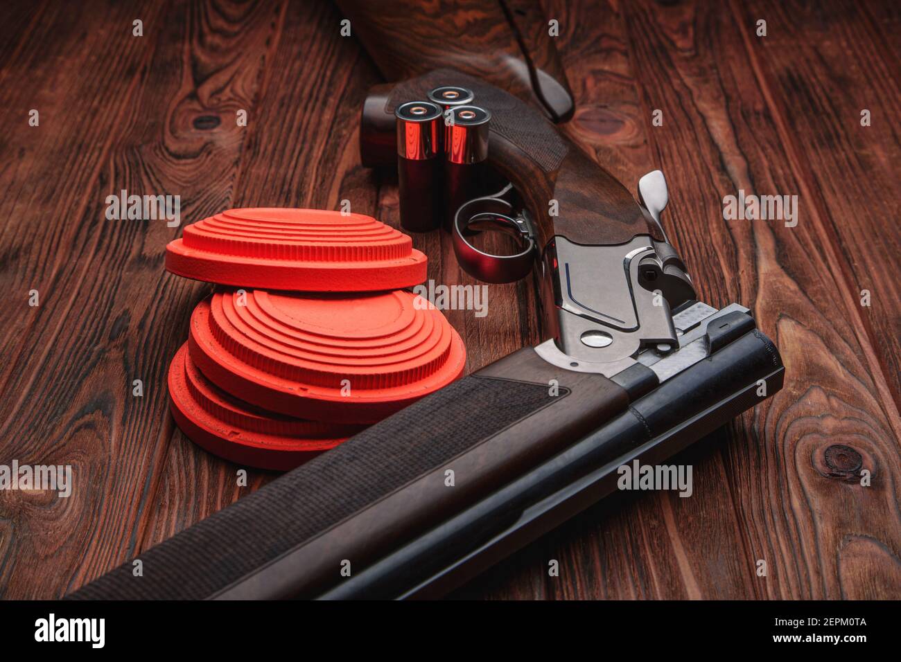 Clay target plates for shooting with rifle on wooden background Stock ...