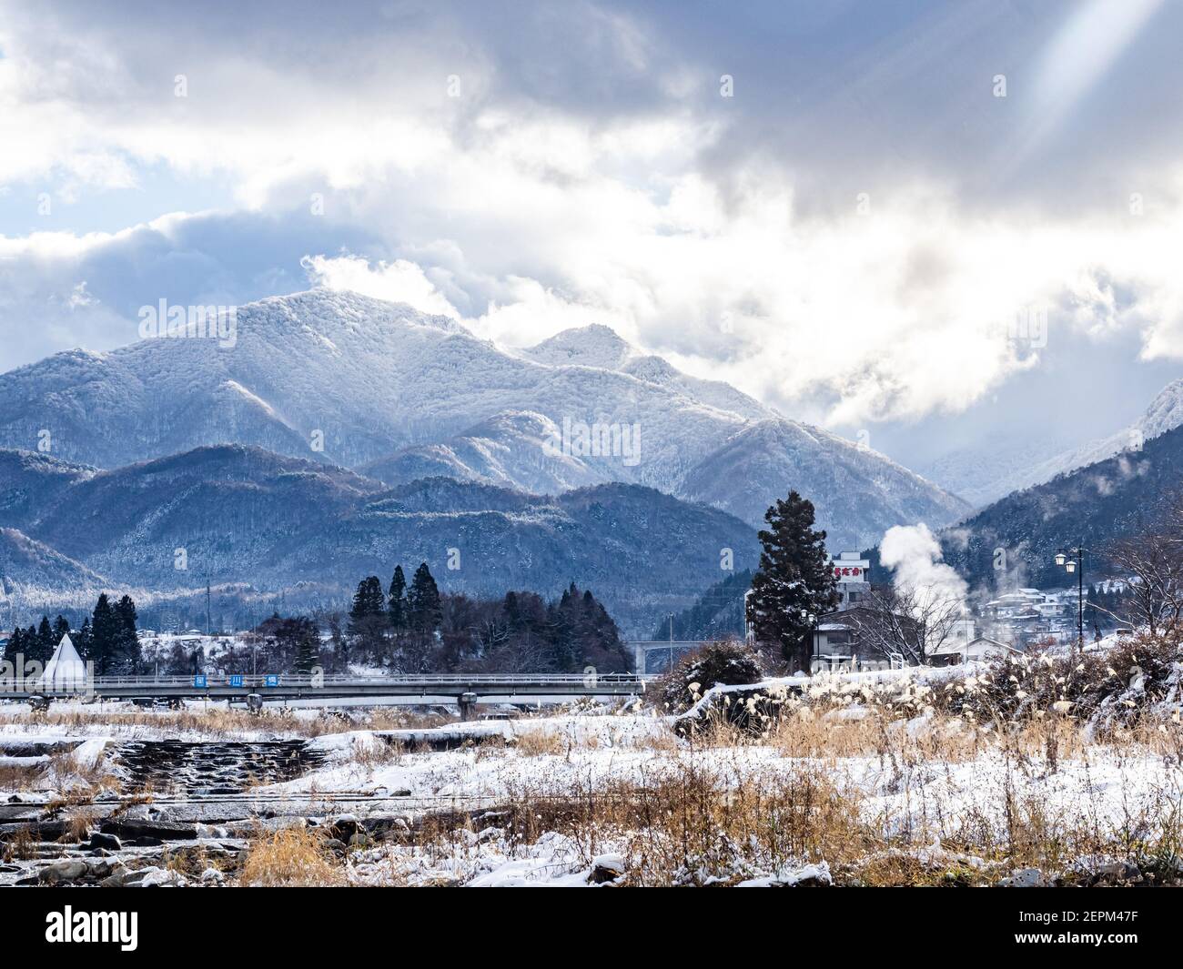 The mountains of the Japanese alps as seen from the Yomase River in ...