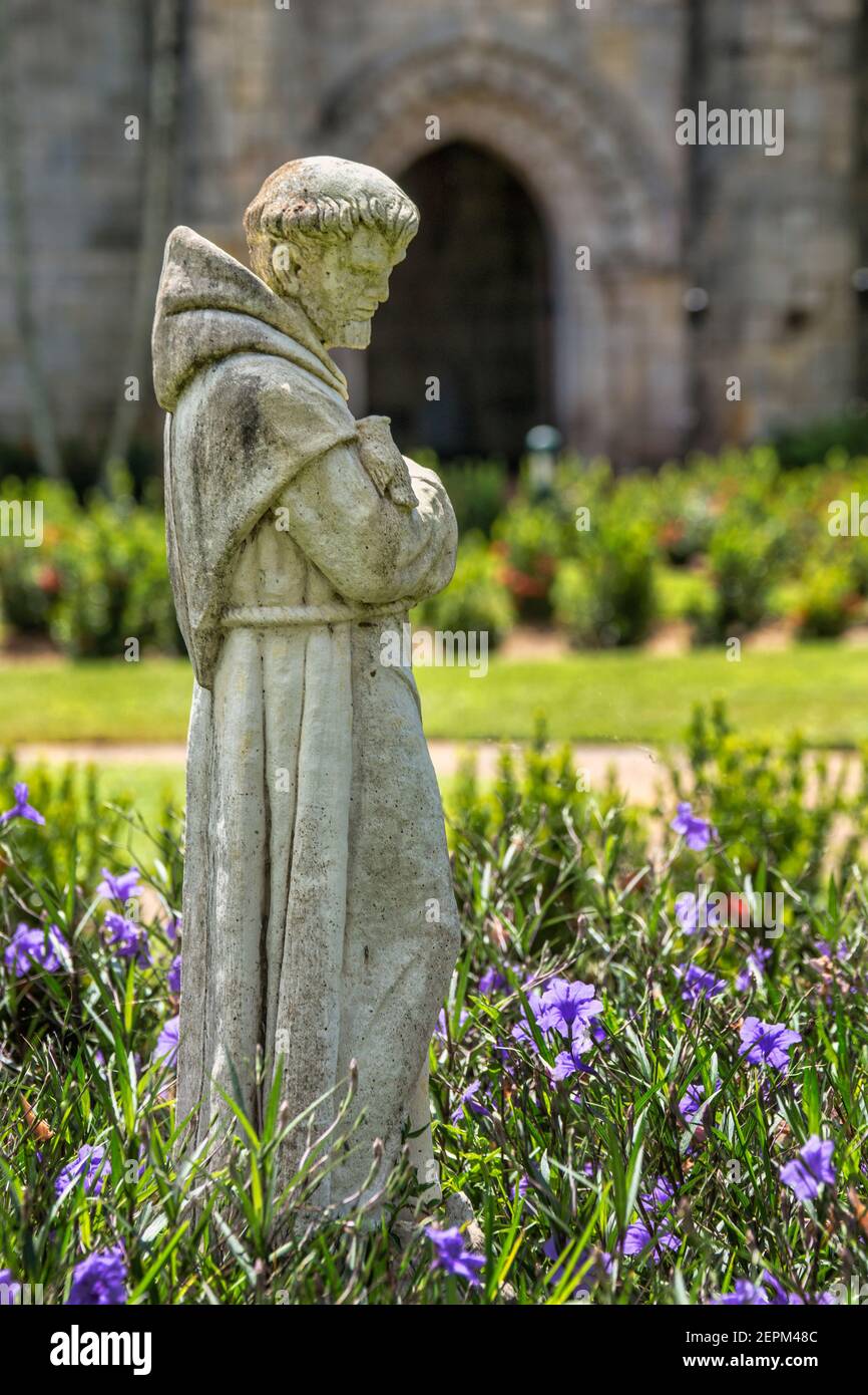 Statue of St. Francis in front of the 12th century Ancient Spanish ...
