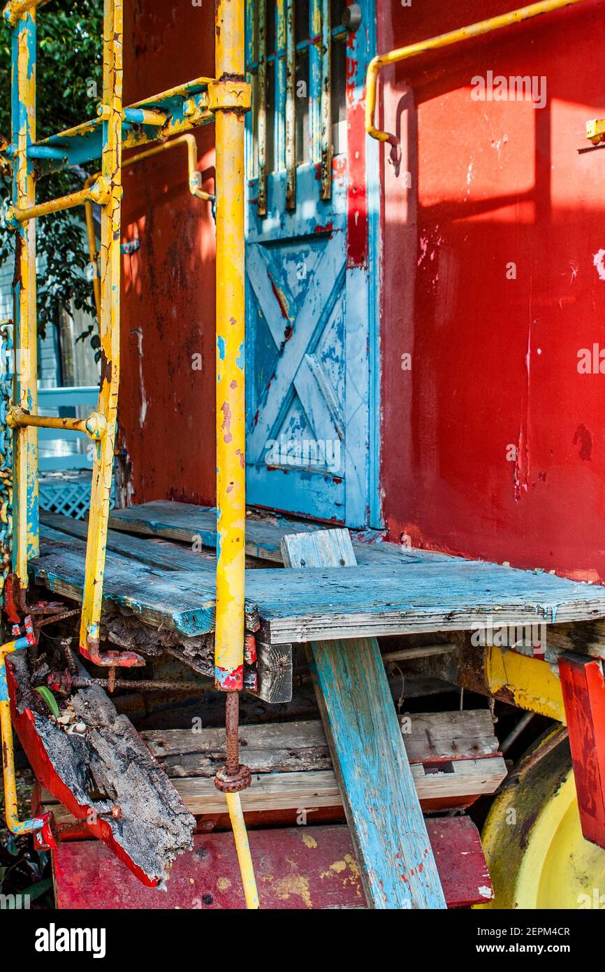 Detail of the end of the dilapidated red caboose outside the Cauley ...