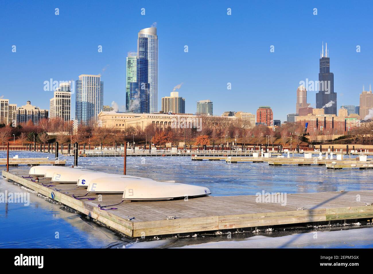 Chicago, Illinois, USA. Turned over row boats on a dock act as a ...
