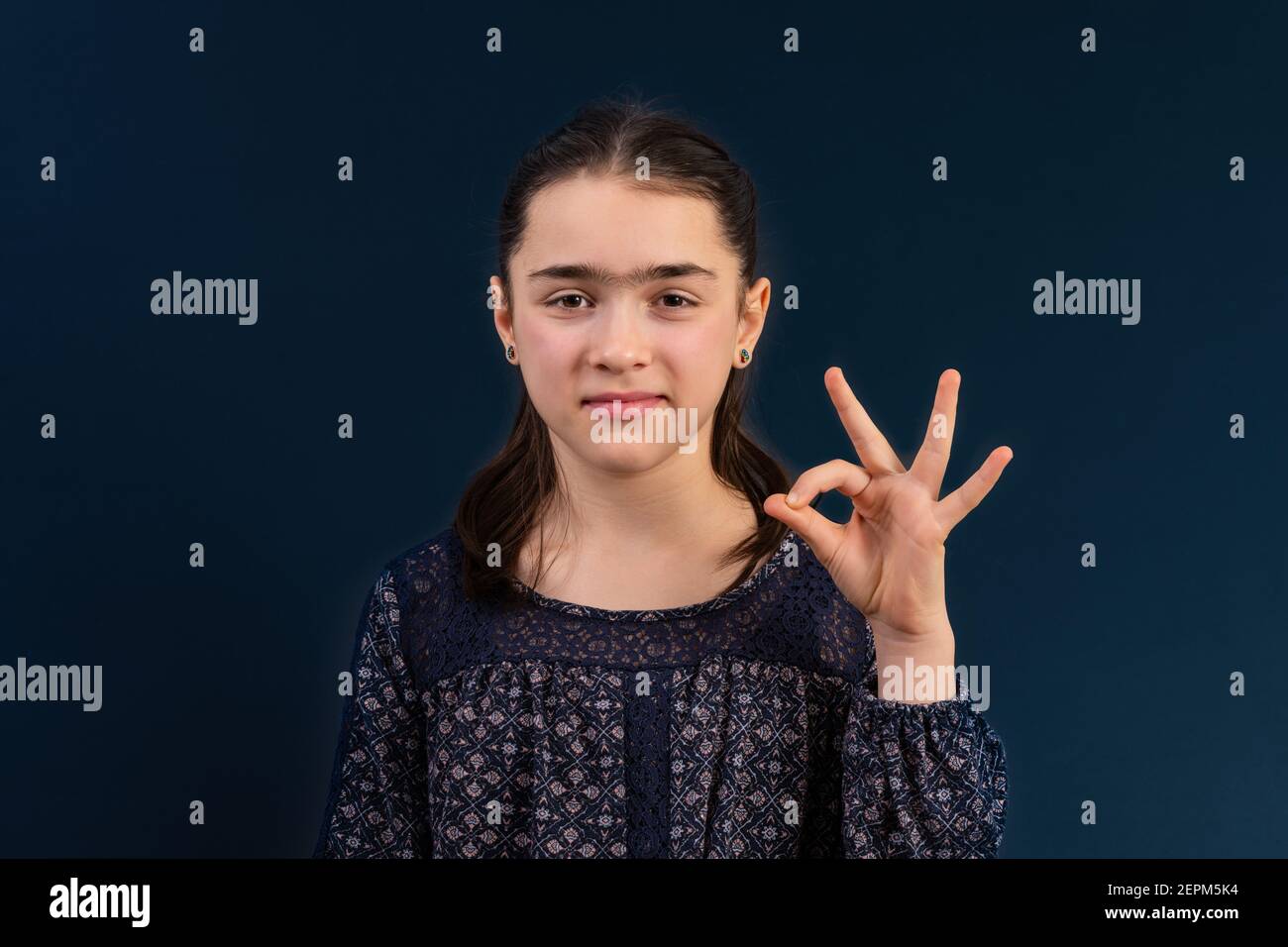 Girl ok okay gesture childhood hi-res stock photography and images - Alamy