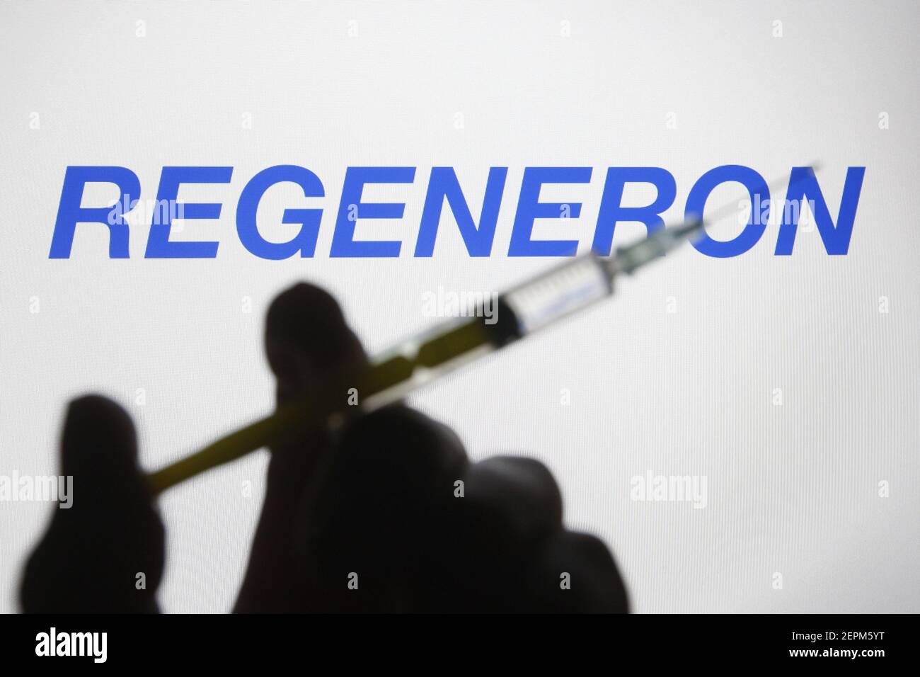 In this photo illustration a Regeneron Pharmaceuticals logo of a US ...