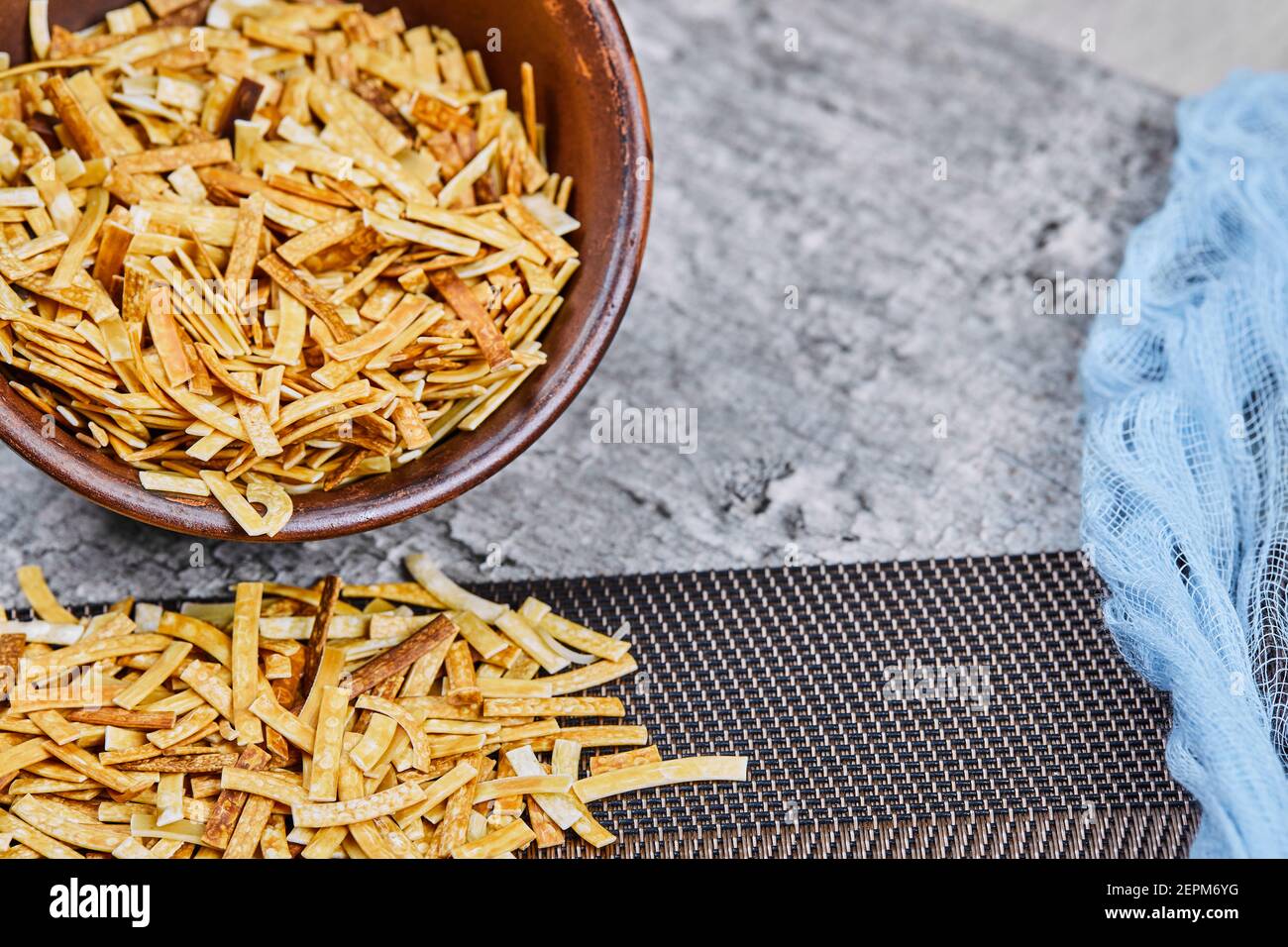 Bowl of crackers on marble background Stock Photo - Alamy