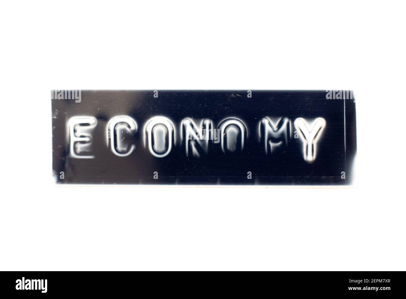 Embossed letter in word economy on black banner with white background ...