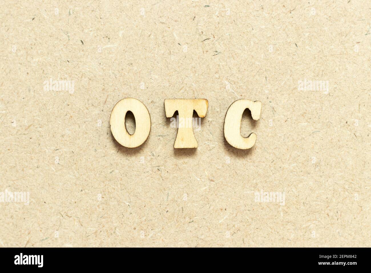 Alphabet letter in word OTC (Abbreviation of over the counter) on wood ...