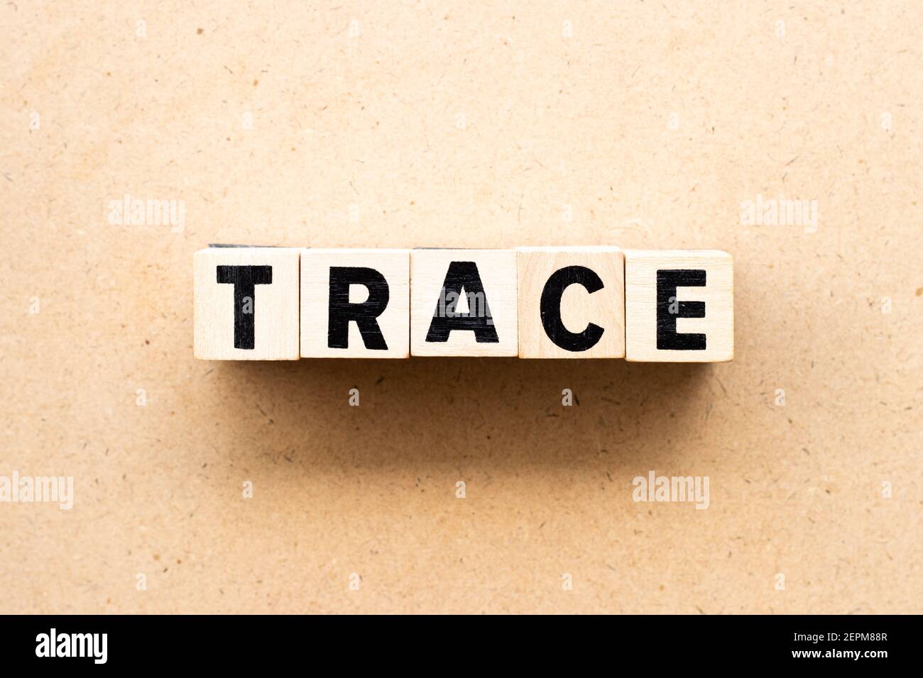 Letter block in word trace on wood background Stock Photo - Alamy
