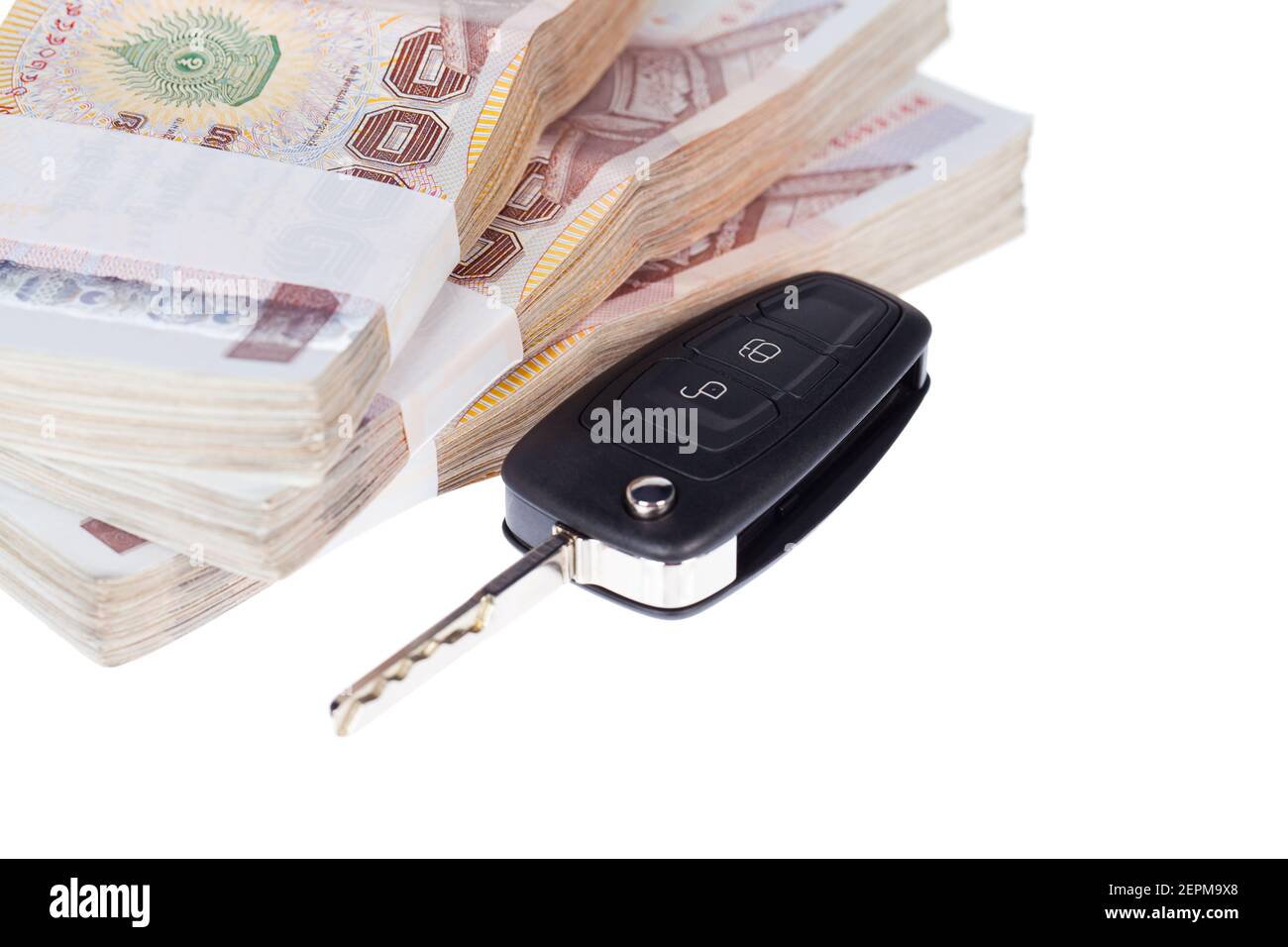 Close up stacks of banknotes with car key (shallow DOF picture ...