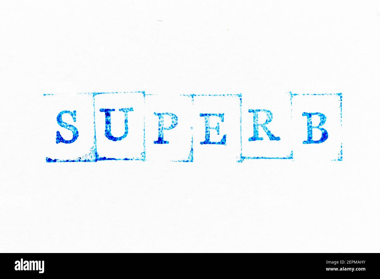 Blue color ink rubber stamp in word superb on white paper background ...