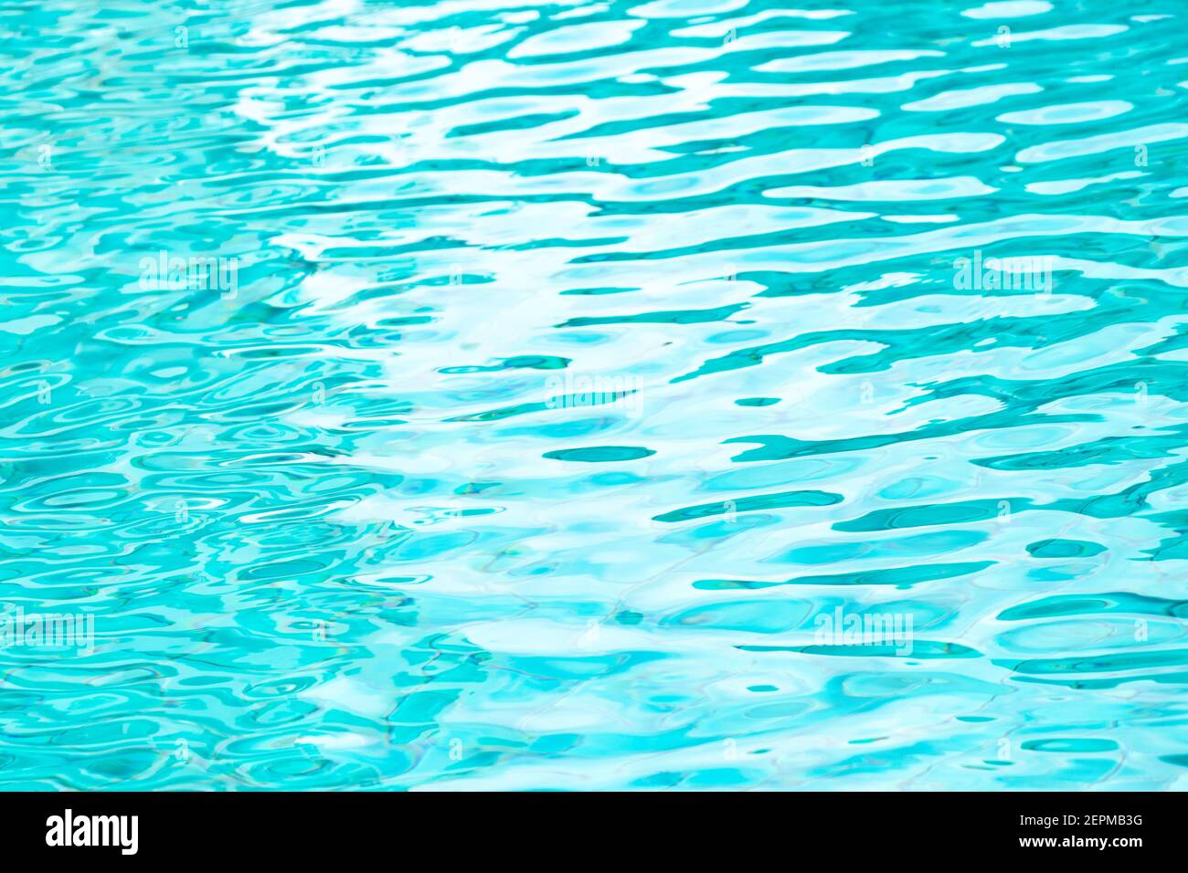 Ripple Water in swimming pool with blue tile floor background Stock ...