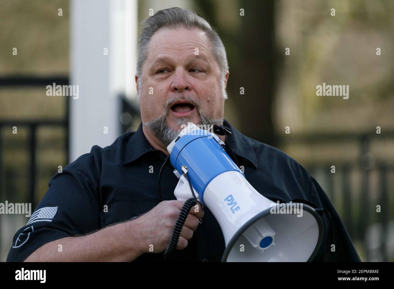 Pastor Lew Wootan speaks to the Proud Boys. About fifty Proud Boys and ...