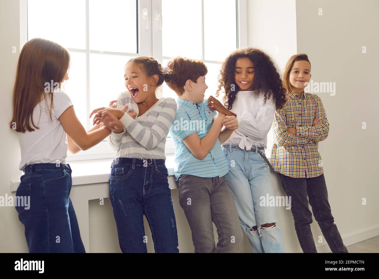 Diverse children group playing hi-res stock photography and images - Alamy