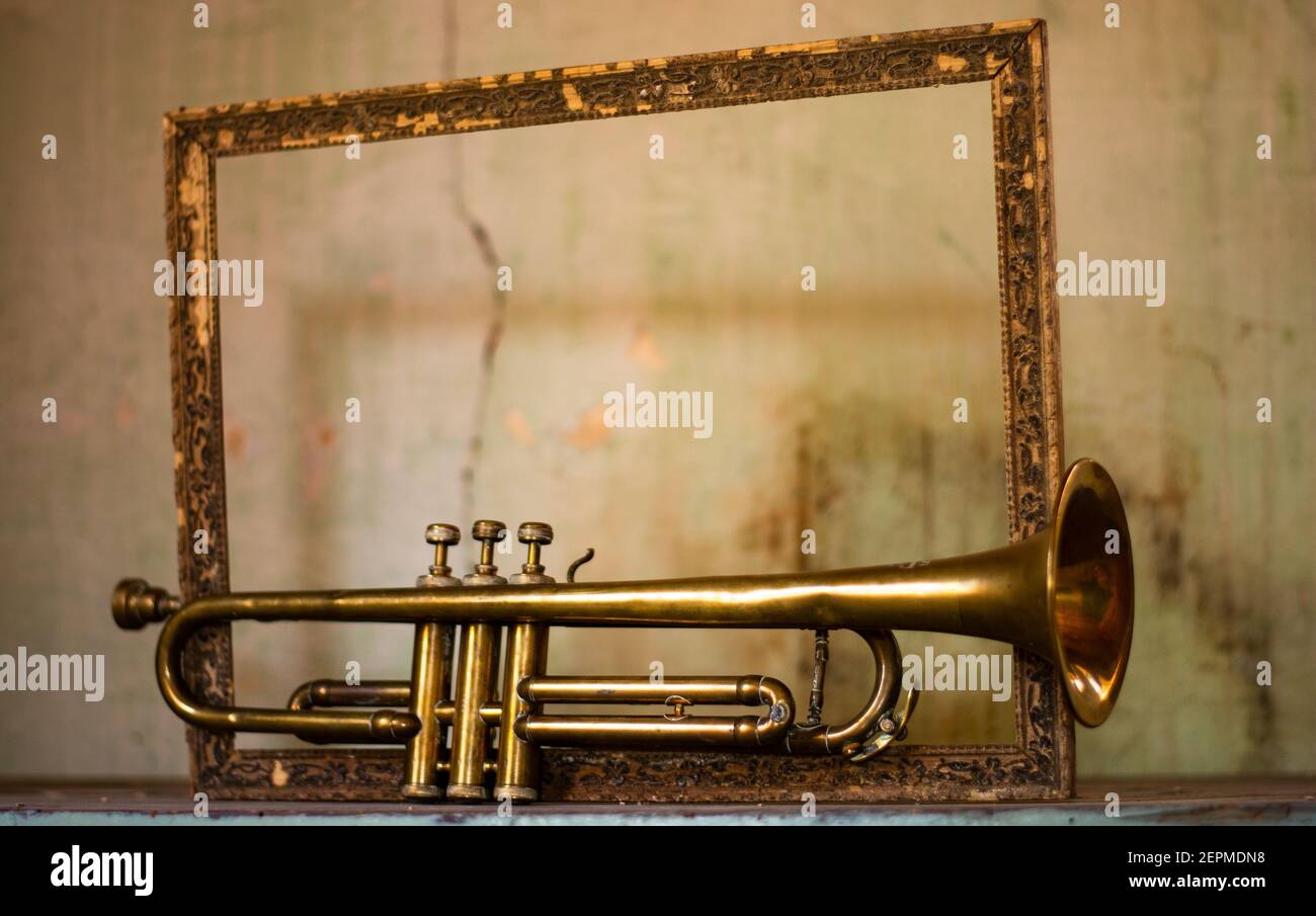 old trumpet on frame Stock Photo - Alamy
