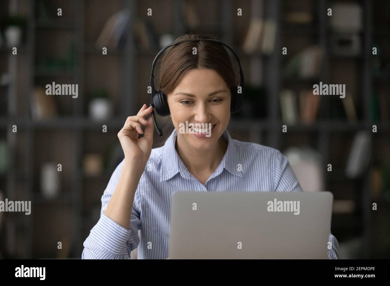 Woman talk headphones in hi-res stock photography and images - Alamy
