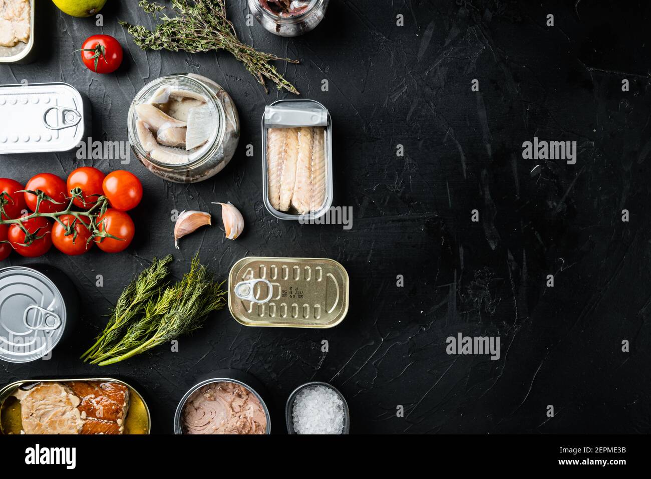 Canned fish with different assortment types of seafood set, on black ...