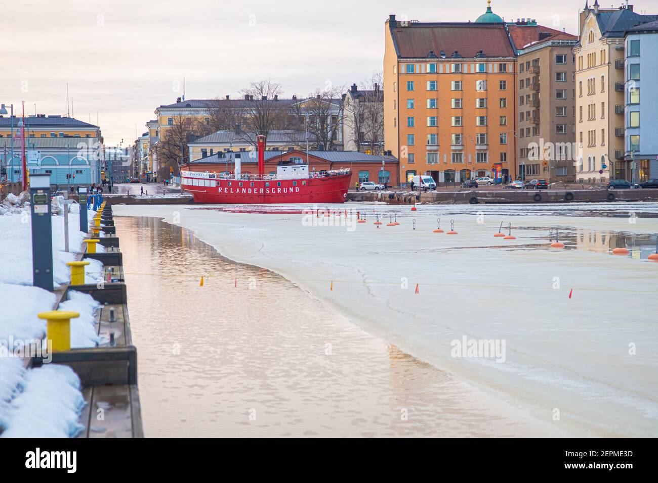 Finland, Helsinki February 26, 2021 The red ship is moored at the pier ...